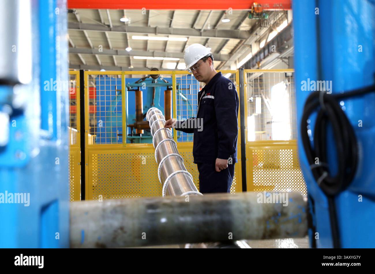 Staff members are processing sample tubes of 2,000-meter ultra-deep ...