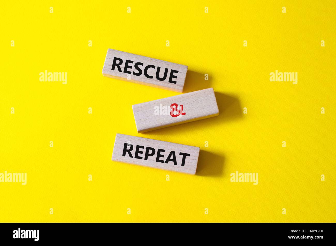 Rescue and Repeat symbol. Wooden blocks with words Rescue and Repeat ...
