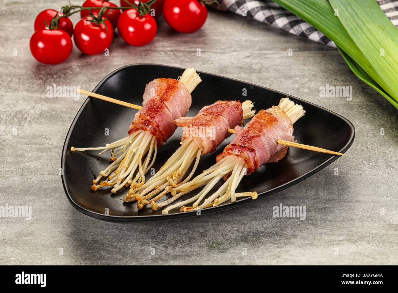 Grilled enoki mushroom with bacon roll wrap Stock Photo - Alamy