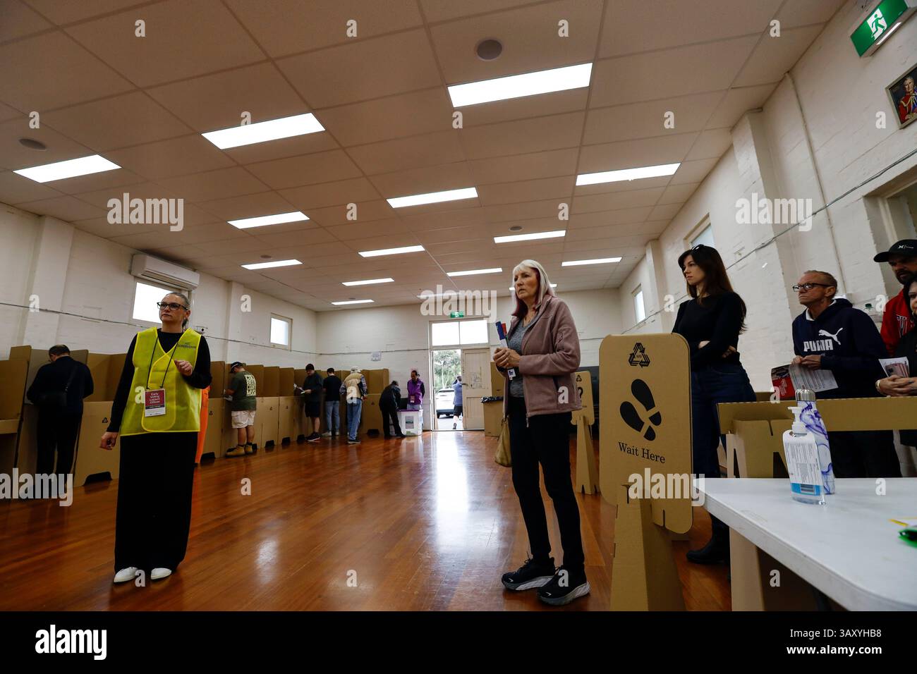 Voters wait to register inside a polling centre during early voting for ...