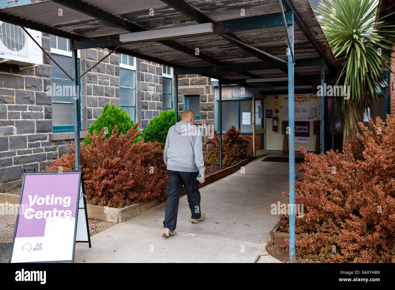 A man walks into a voting center during the early voting period for the ...