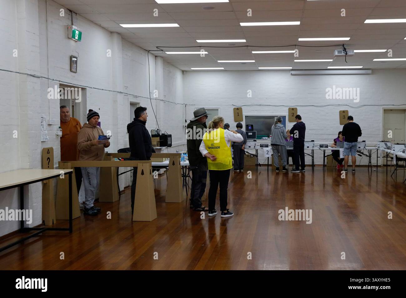 Voters wait to register inside a polling centre during early voting for ...
