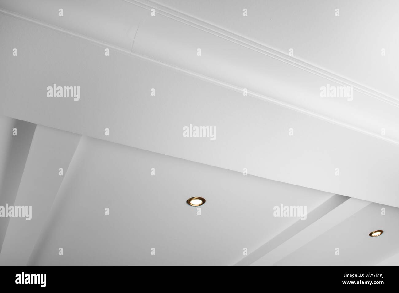 Suspended and grid ceiling with LED spots lamps and drywall ...