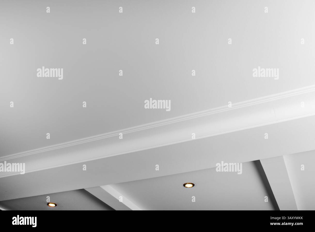 Suspended and grid ceiling with LED spots lamps and drywall ...