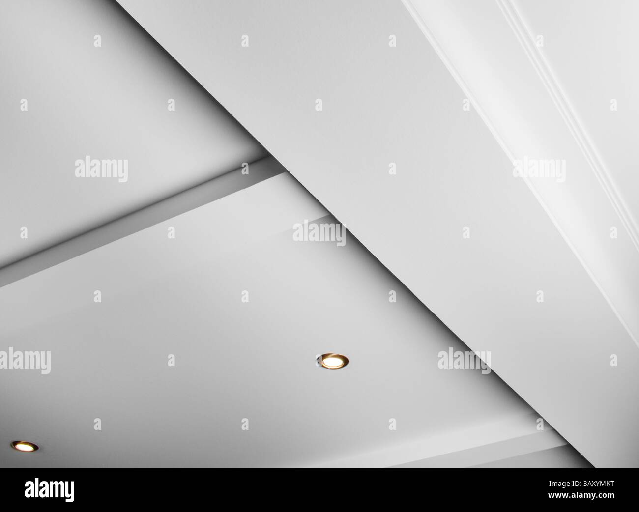 Suspended and grid ceiling with LED spots lamps and drywall ...