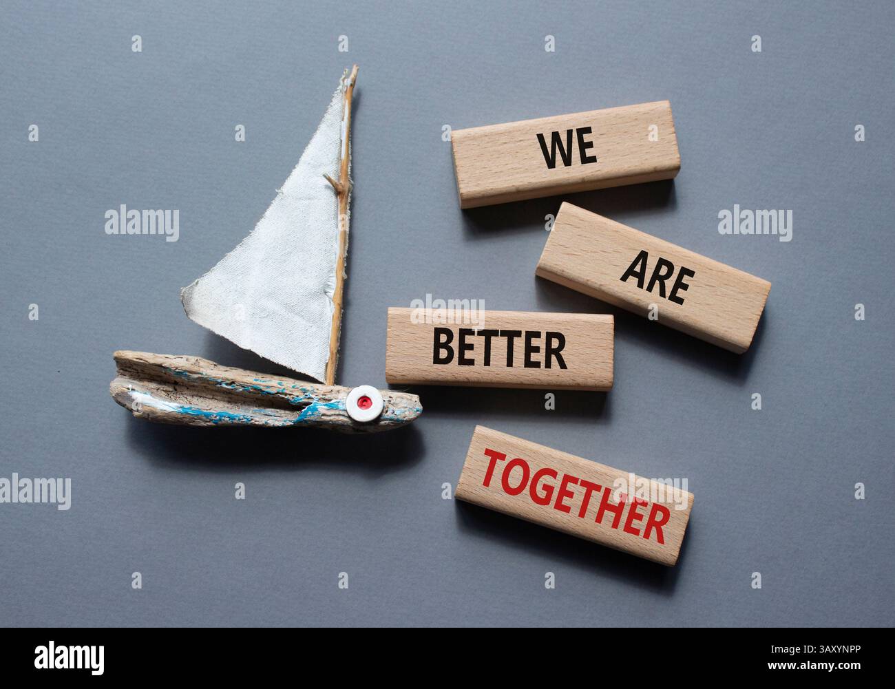 We are better together symbol. Wooden blocks with words We are better ...