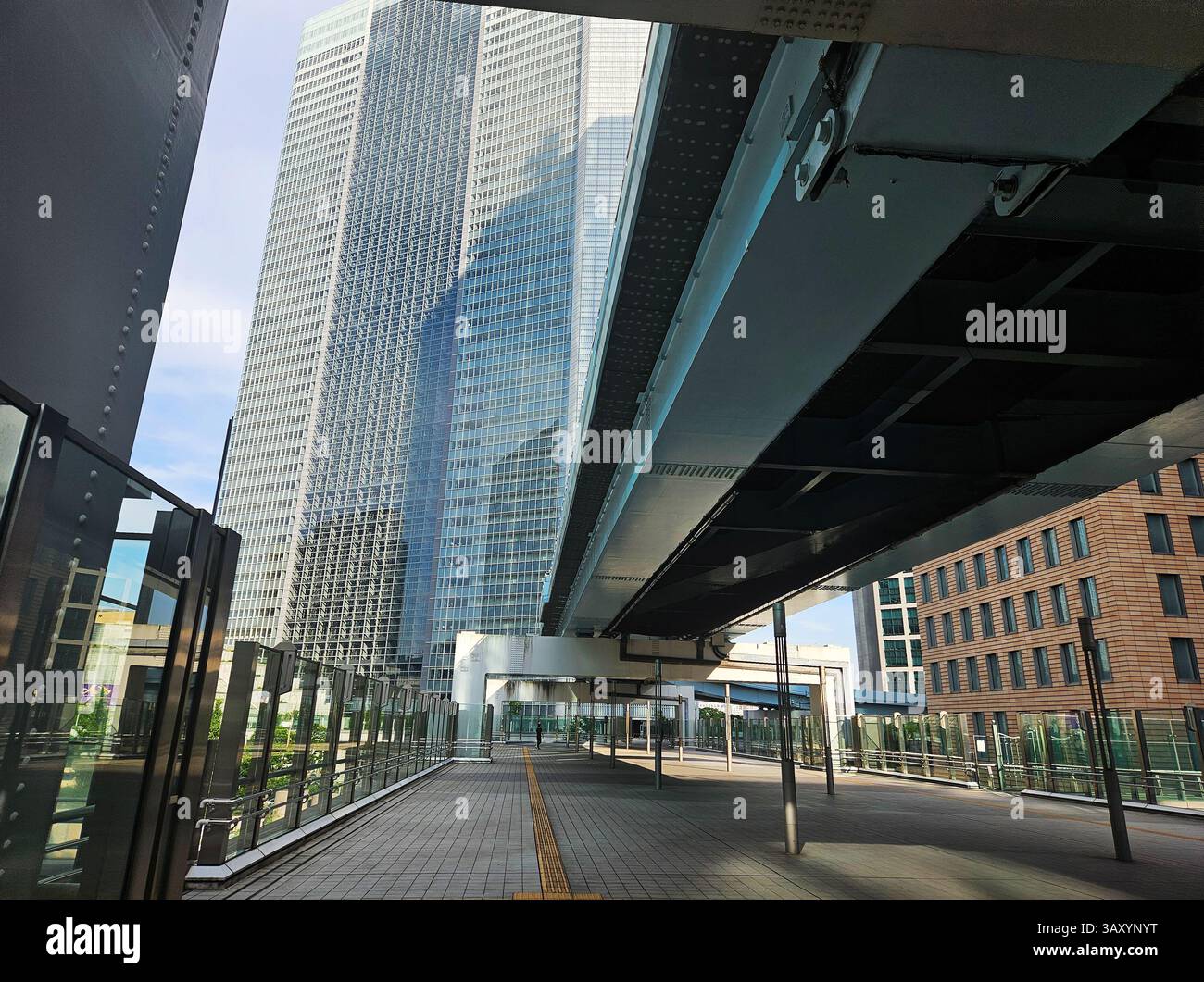 Layered Pedestrian Walkway and Overpass beneath Shiodome Skyscrapers ...