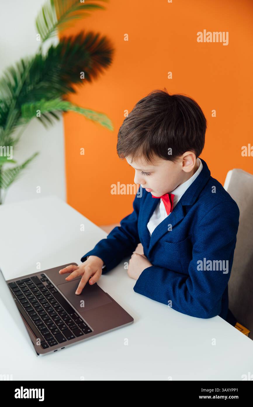 School kids on laptop in class hi-res stock photography and images - Alamy