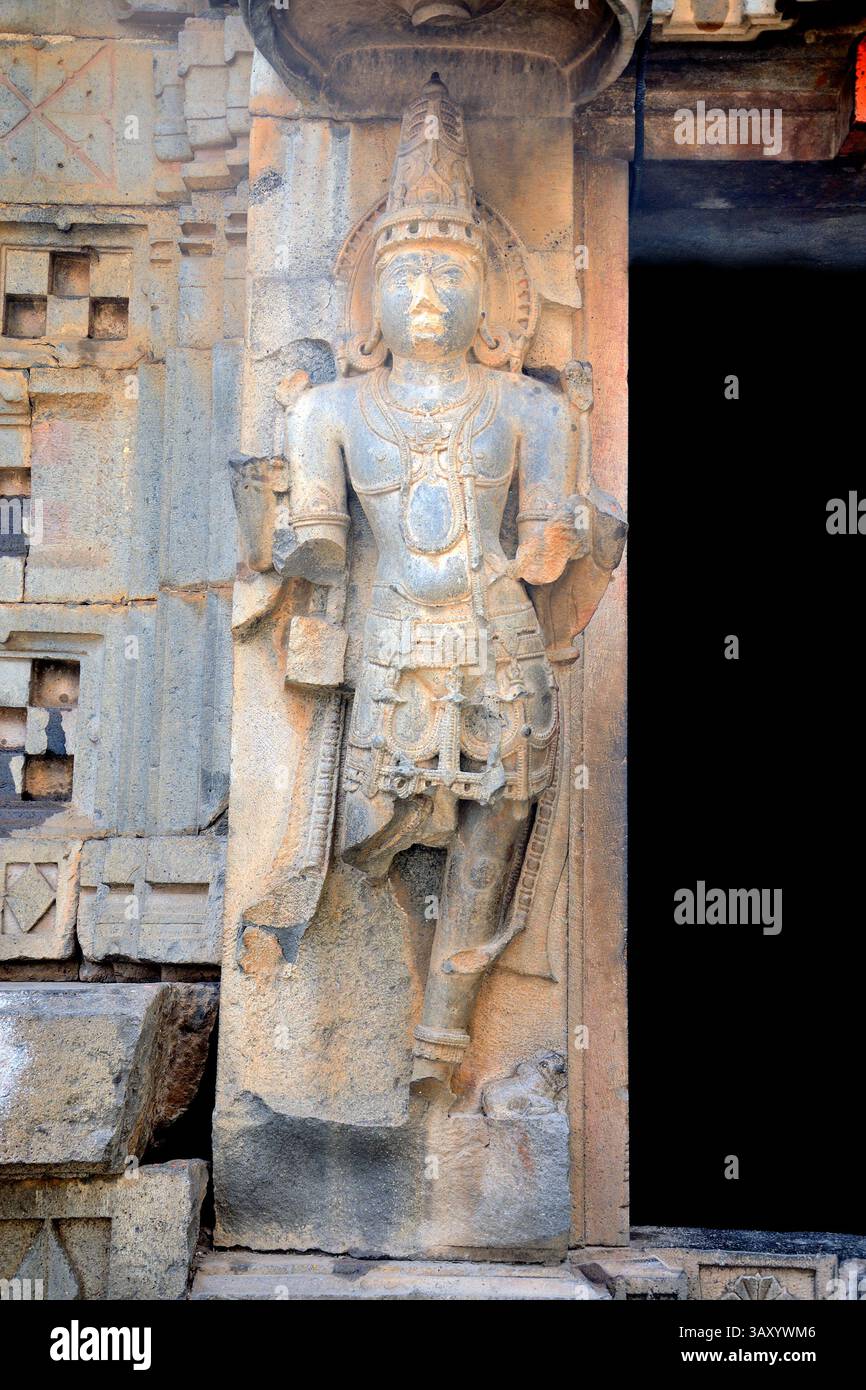 Carving details on the idol of a Dwarpal (gate keeper), Pandeshwar ...