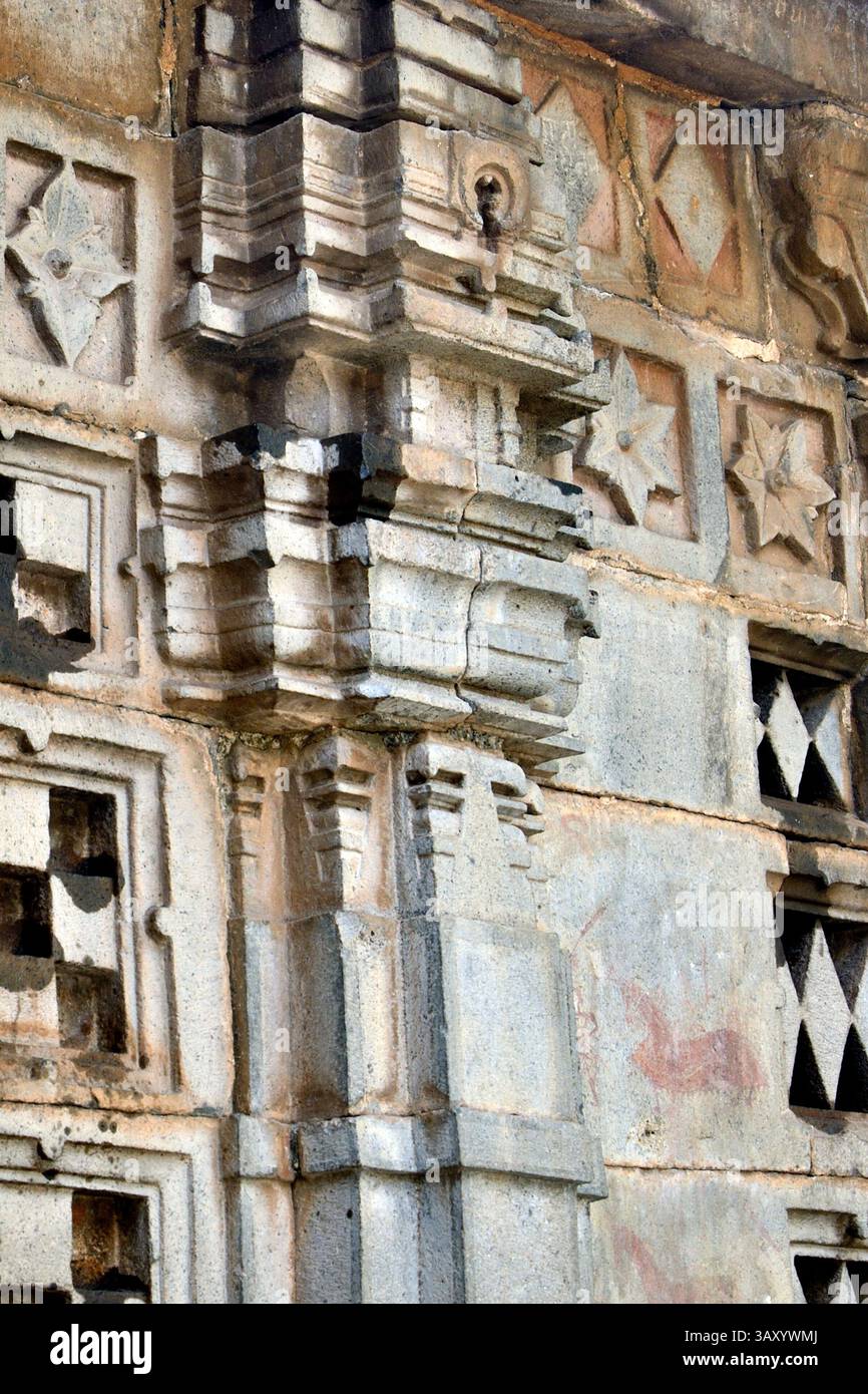 Carving details on the idol of a Dwarpal (gate keeper), Pandeshwar ...