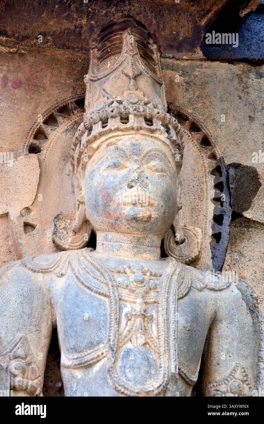 Carving details on the idol of a Dwarpal (gate keeper), Pandeshwar ...