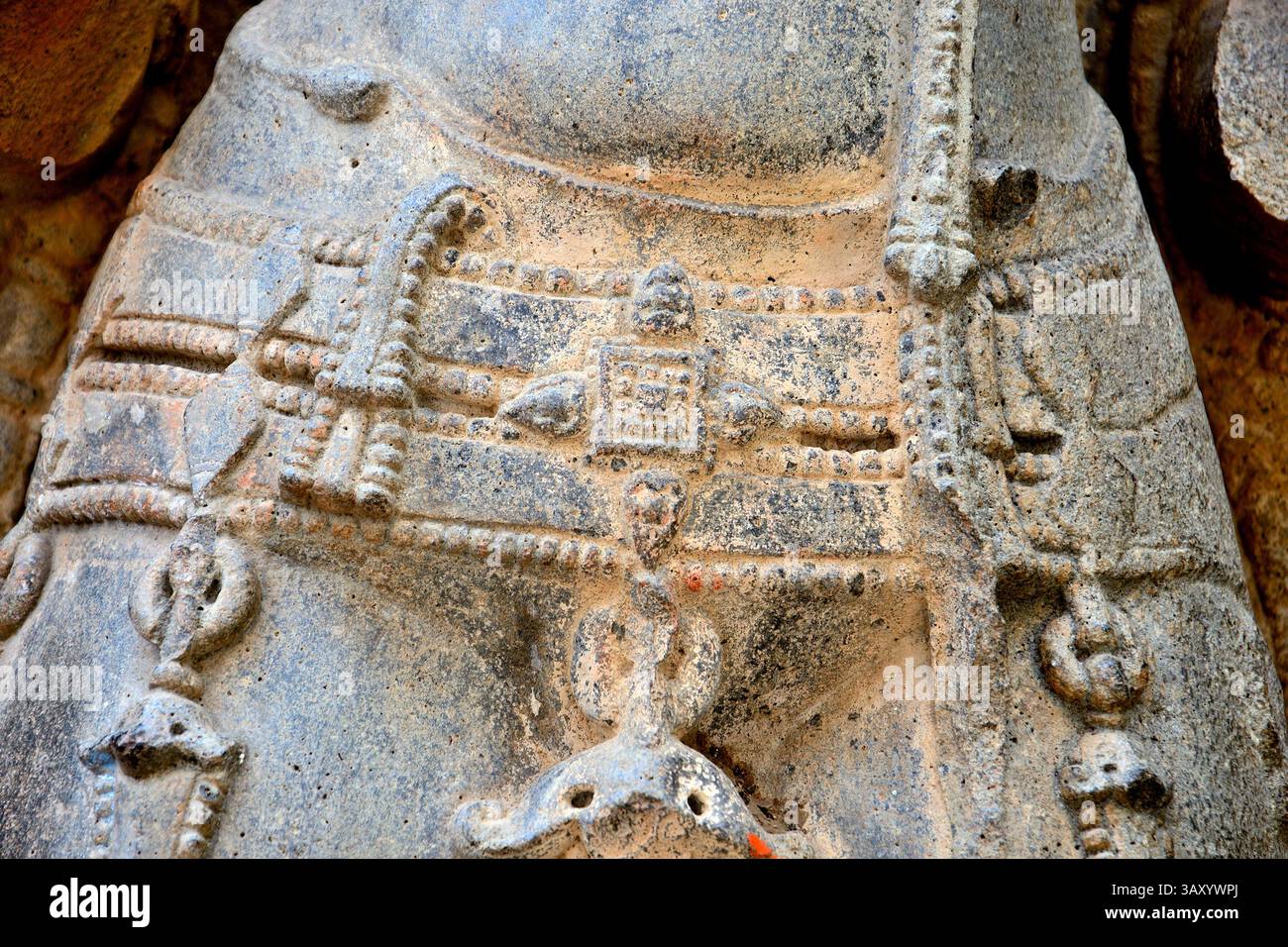 Carving details on the idol of a Dwarpal (gate keeper), Pandeshwar ...