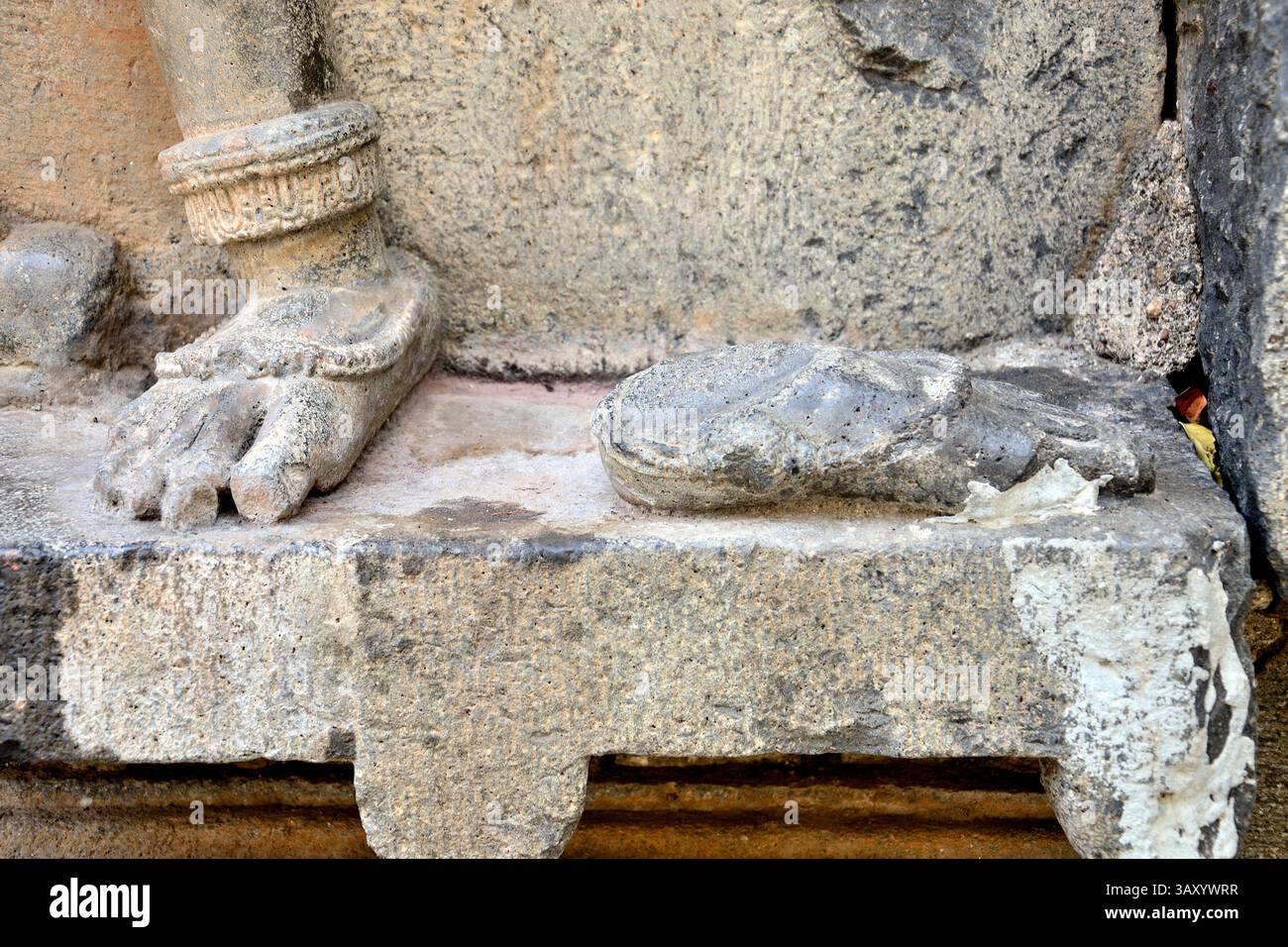 Carving details on the idol of a Dwarpal (gate keeper), Pandeshwar ...