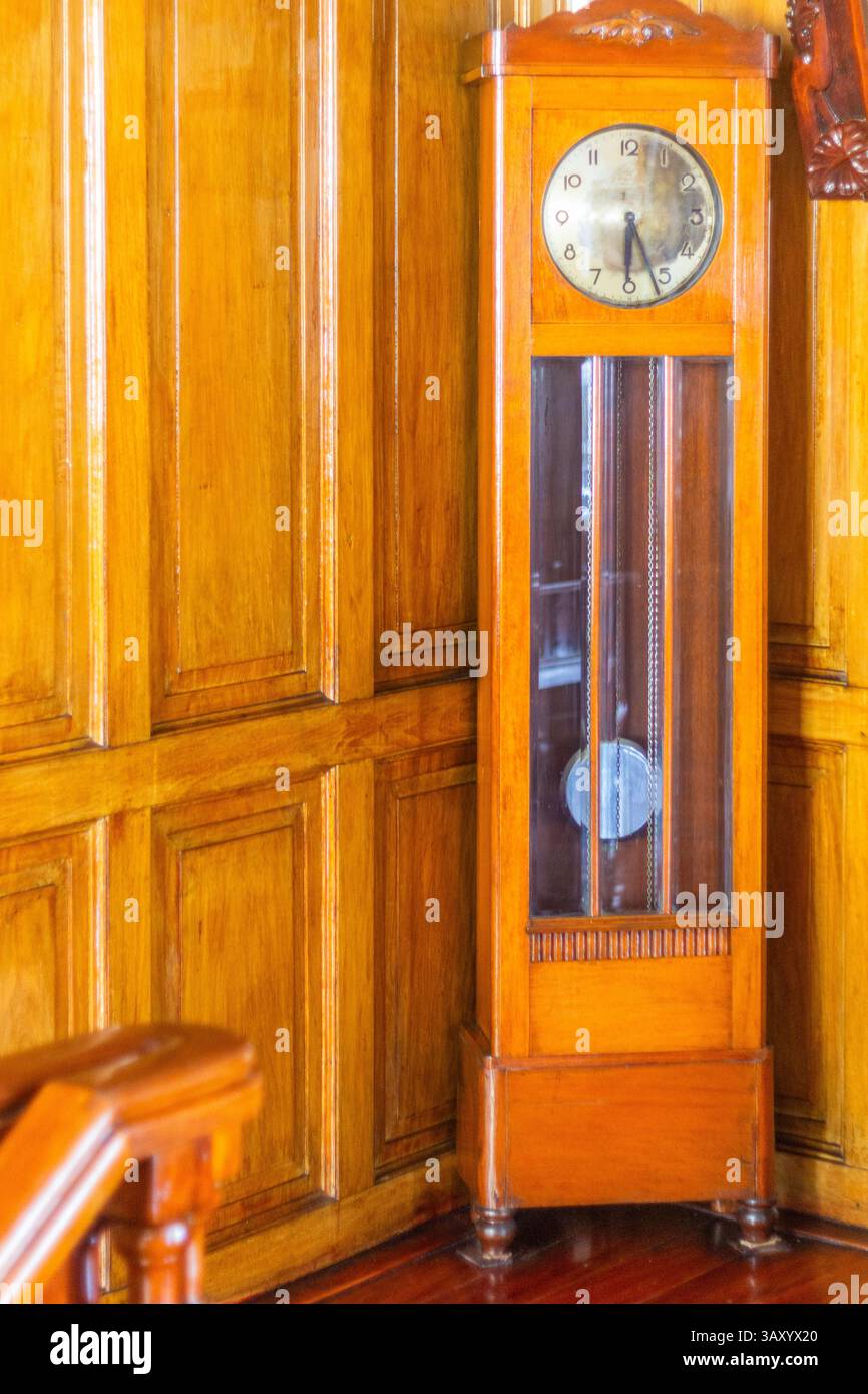 An old grandfather clock stands inside a heritage Filipino mansion in ...
