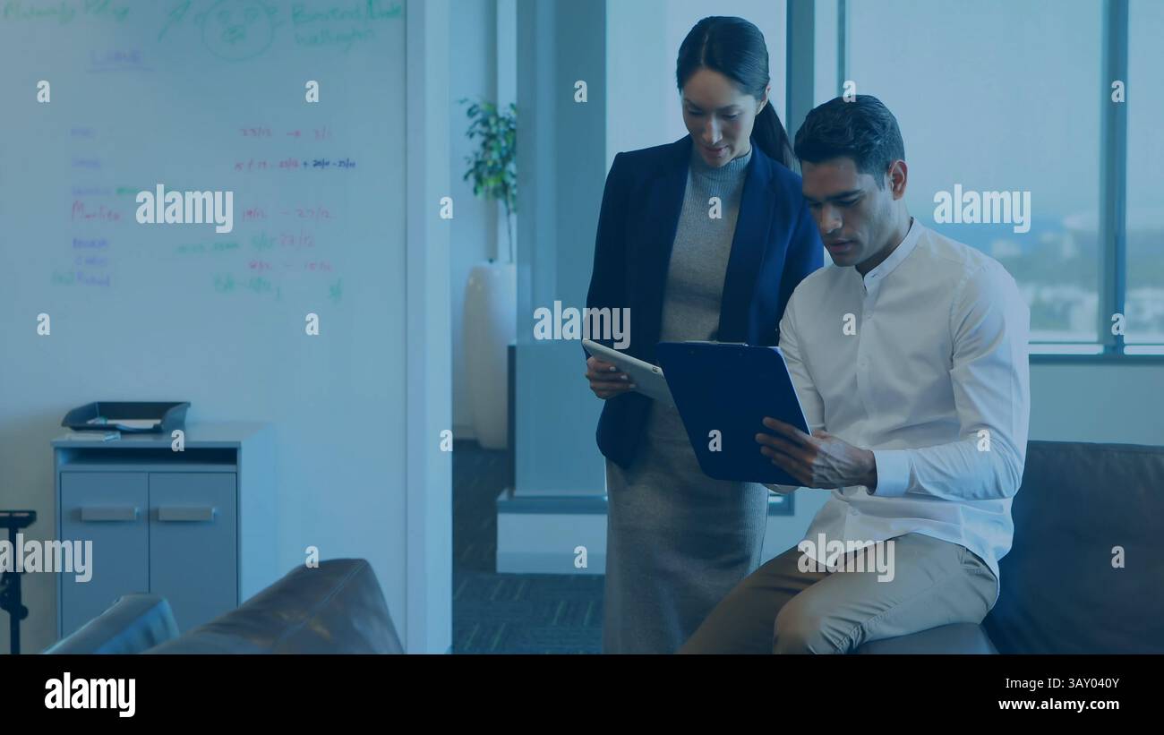 Two workers are collaborating in flat design office lounge with tablet ...