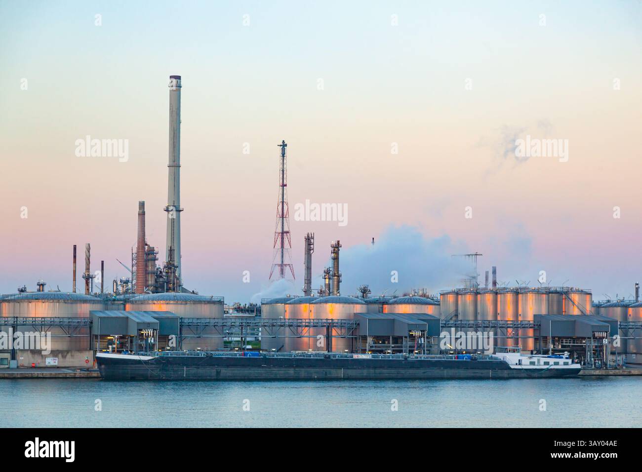 Oil ship docked at the oil berth in oil refinery Stock Photo - Alamy