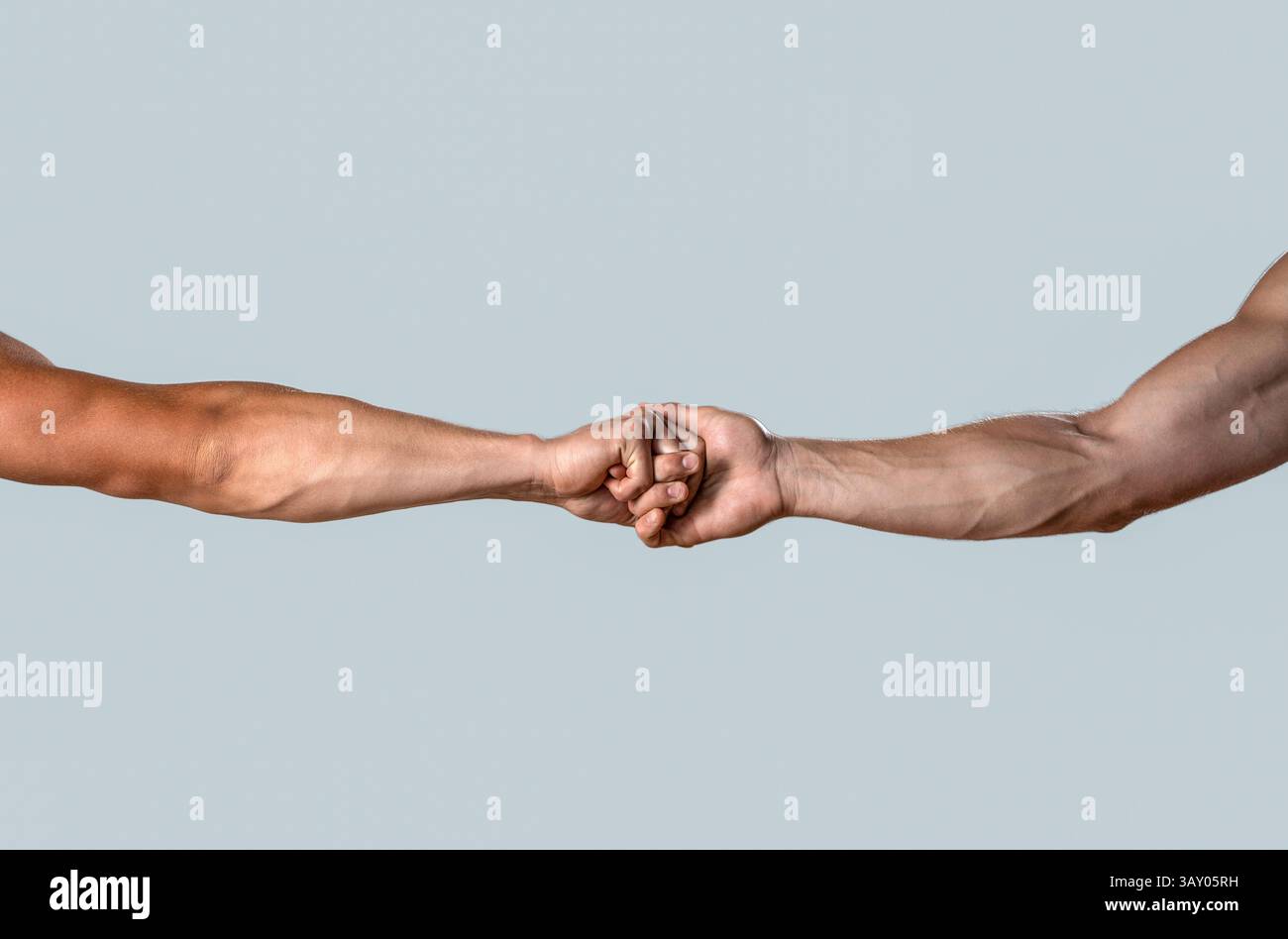 Two male hands reaching towards each other on isolated white background ...