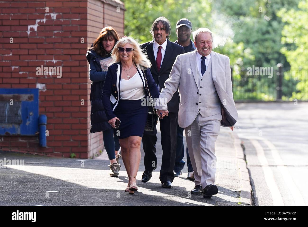 Karen Spragg (left) arrives at Leicester Magistrates' Court, where she ...
