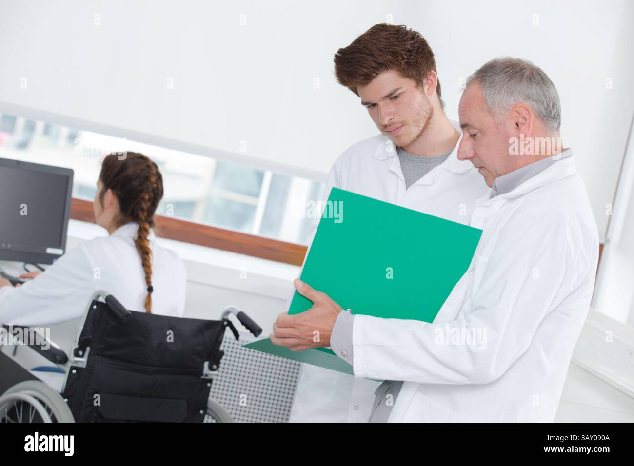 student and teacher in engineering course Stock Photo - Alamy