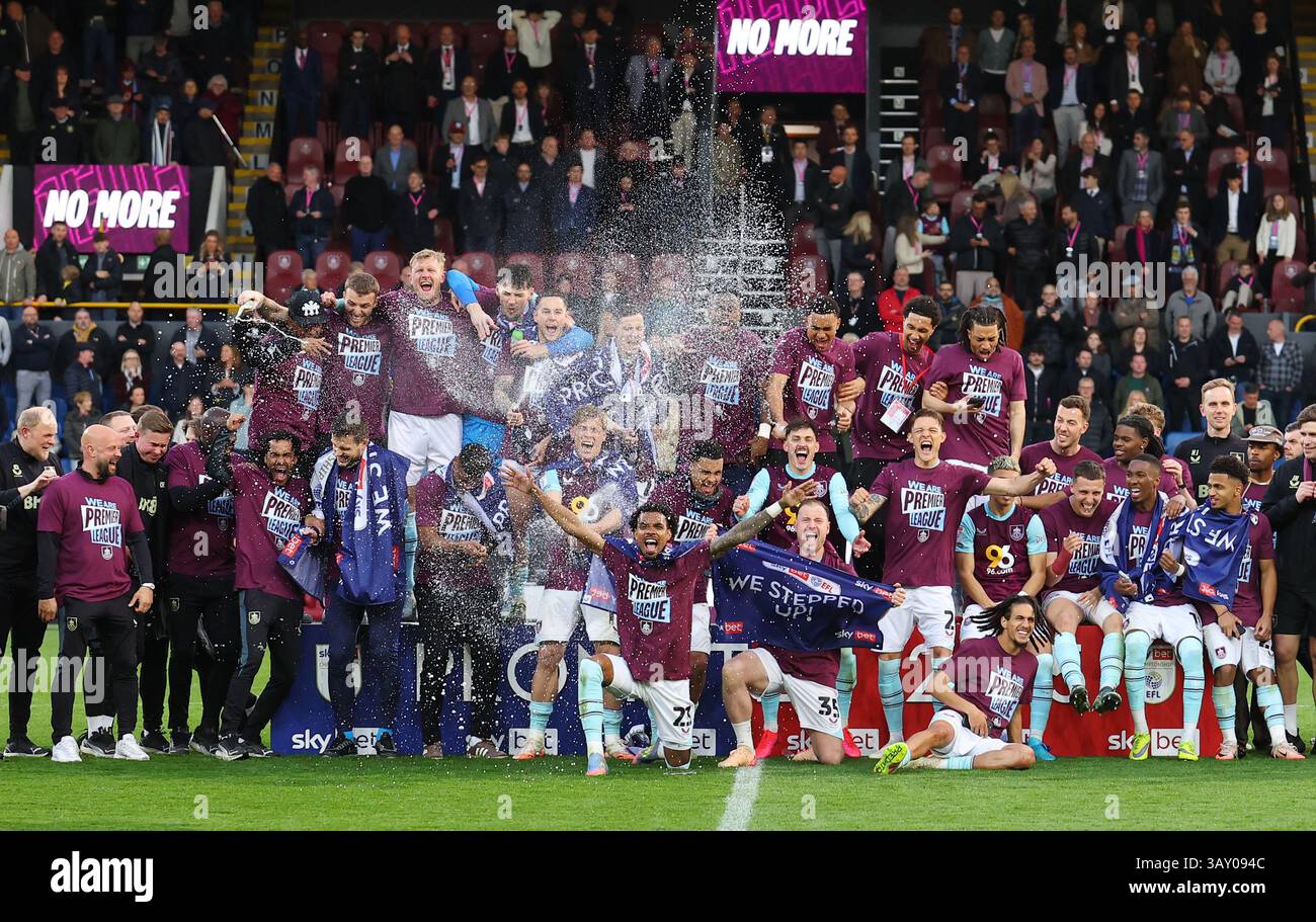 Burnley, UK. 21st Apr, 2025. Burnley players celebrate promotion during ...