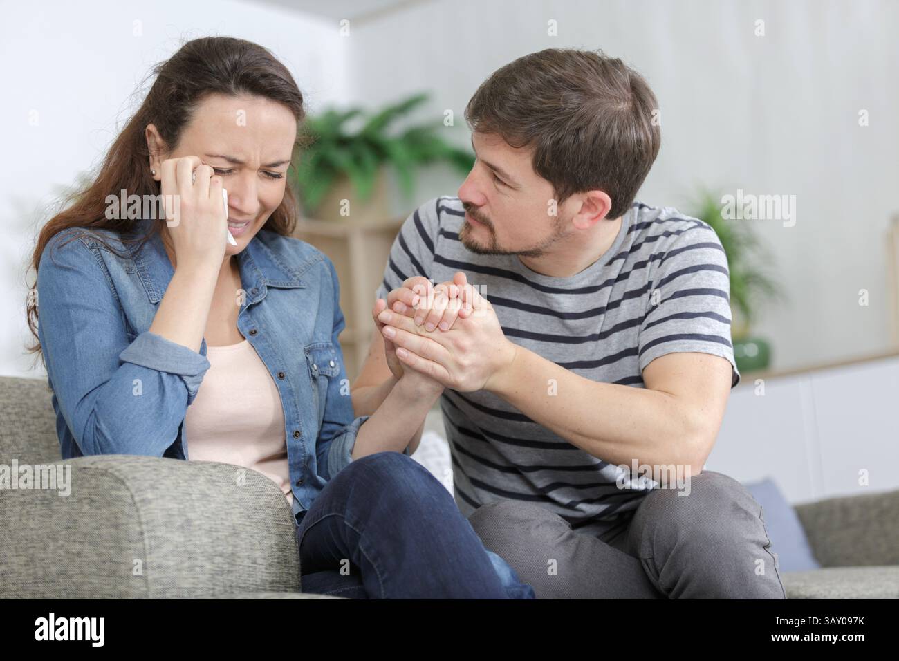 Comforting crying girl hi-res stock photography and images - Alamy