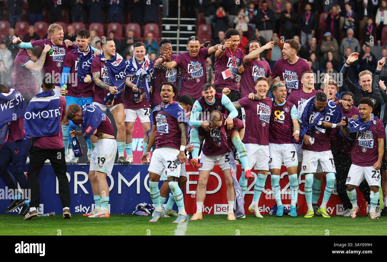 Burnley, UK. 21st Apr, 2025. Burnley players celebrate promotion during ...