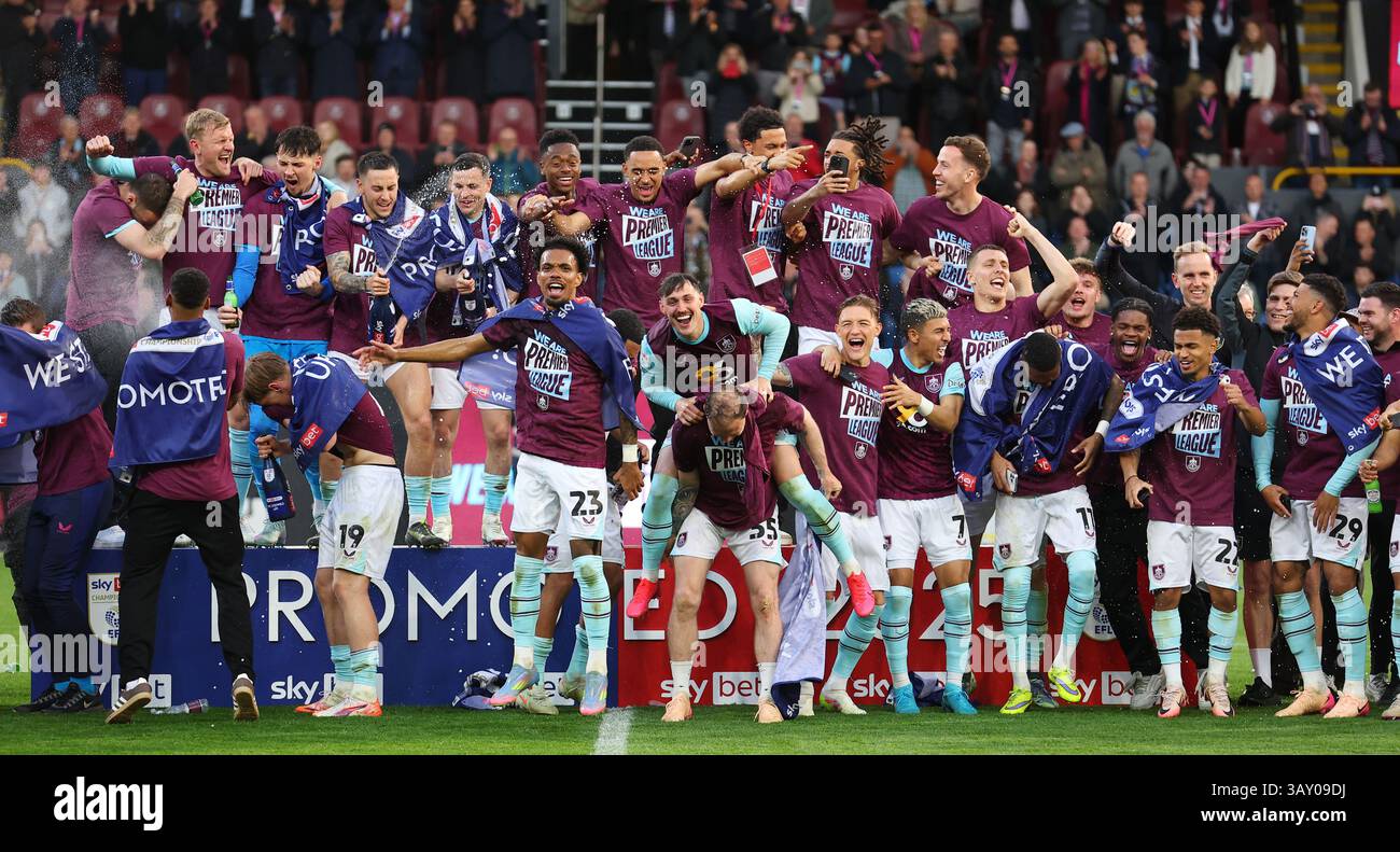 Burnley, England, 21st April 2025. Burnley players celebrate promotion ...