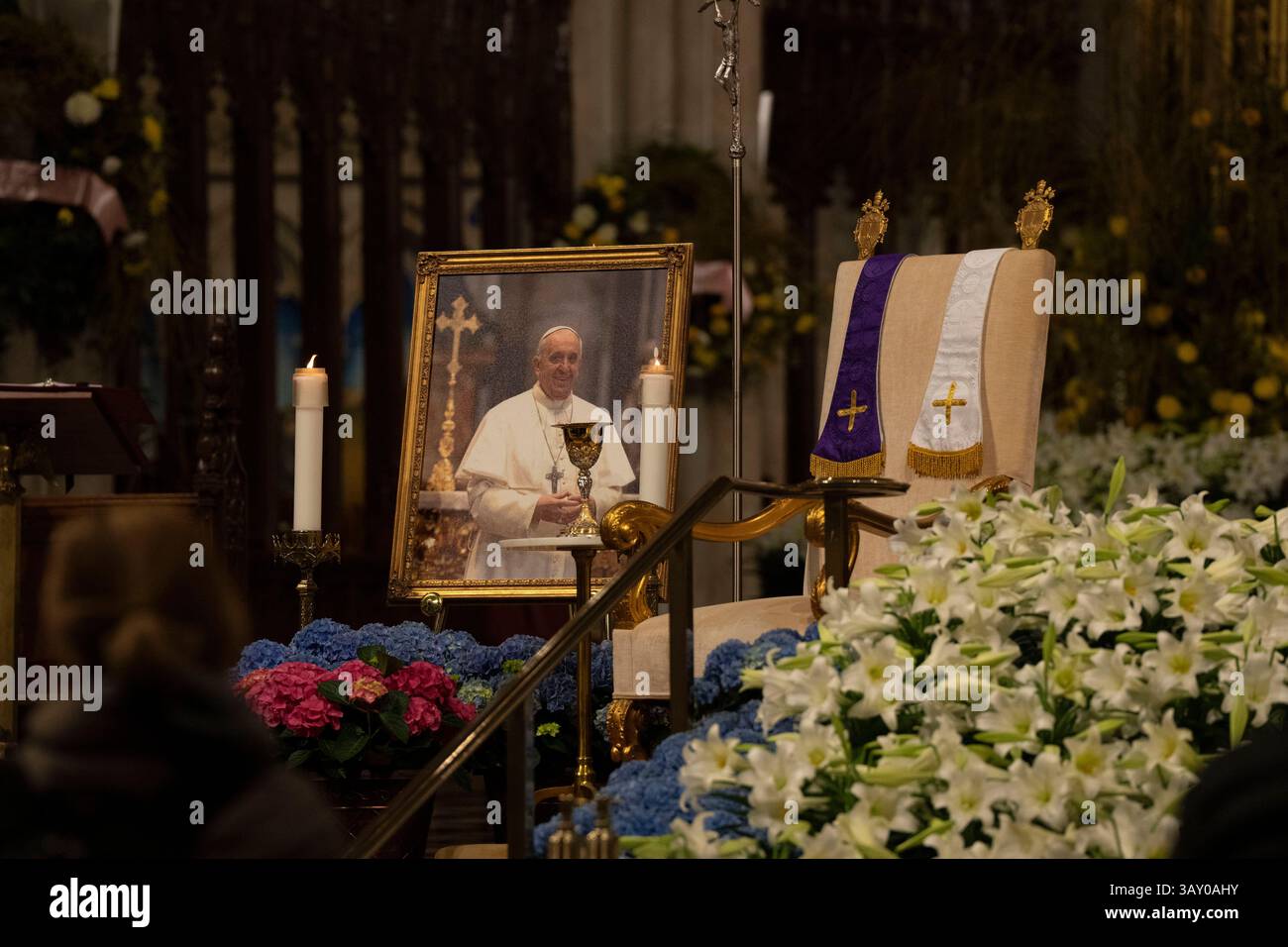 A photo of Pope Francis sits at the altar of St. Patrick's Cathedral ...