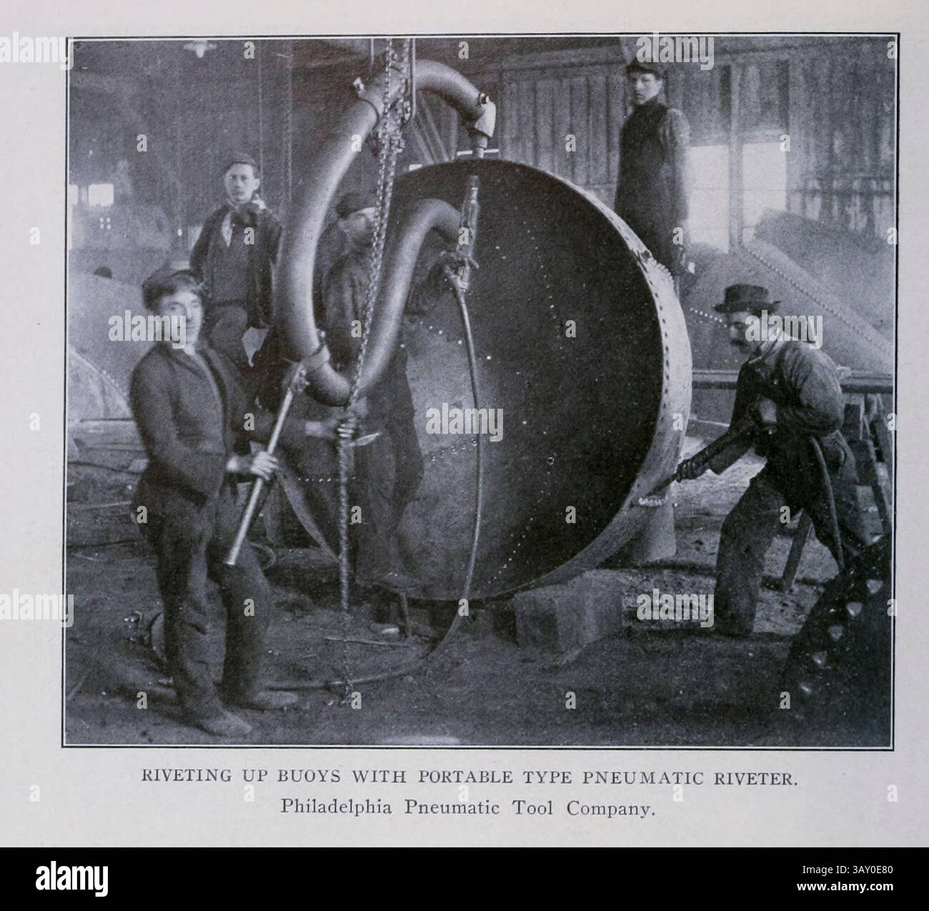 RIVETING UP BUOYS WITH PORTABLE TYPE PNEUMATIC RIVETER. Philadelphia ...