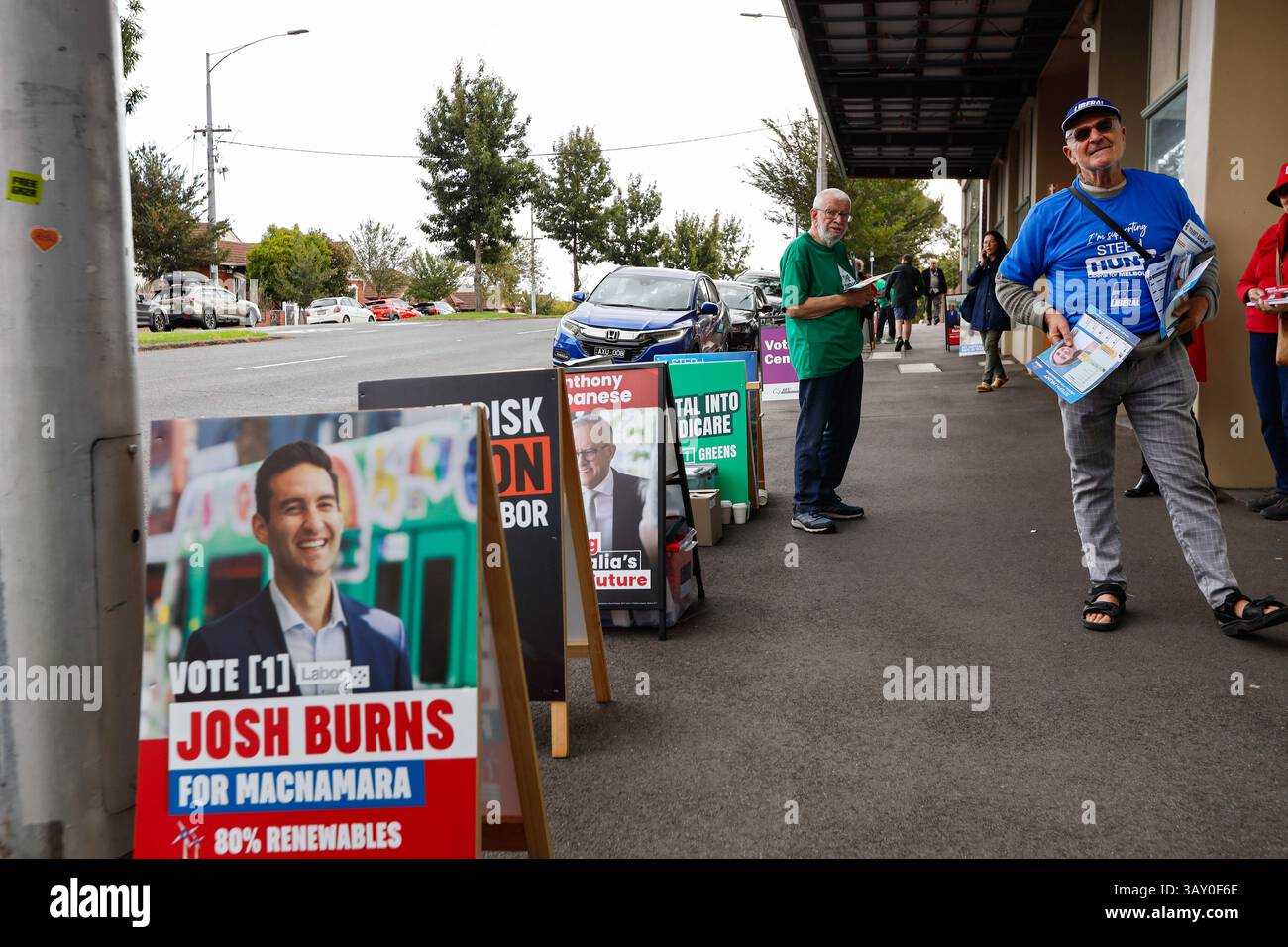 Campaign posters and signs are seen outside a polling centre during the ...