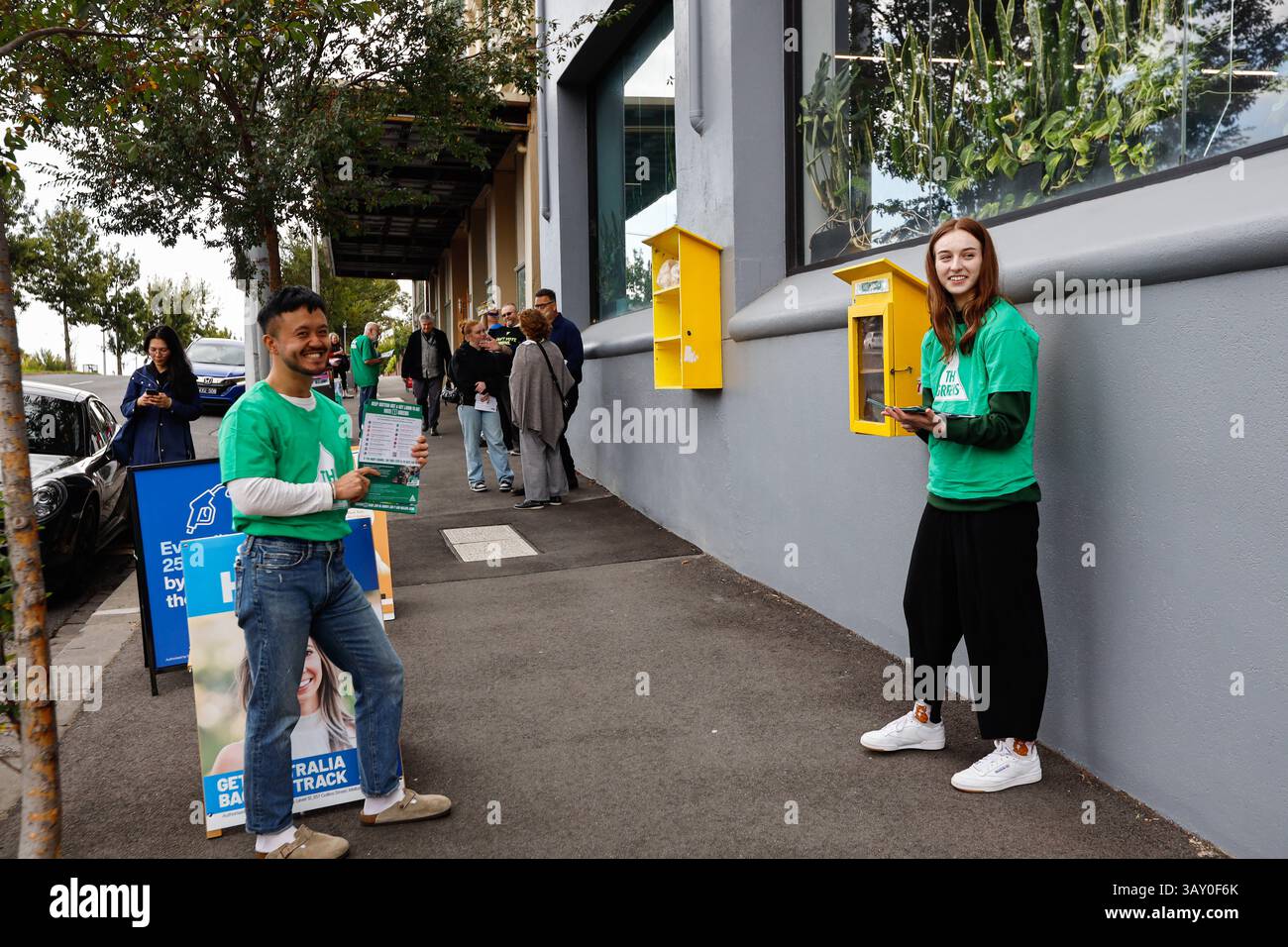 Campaign posters and signs are seen outside a polling centre during the ...