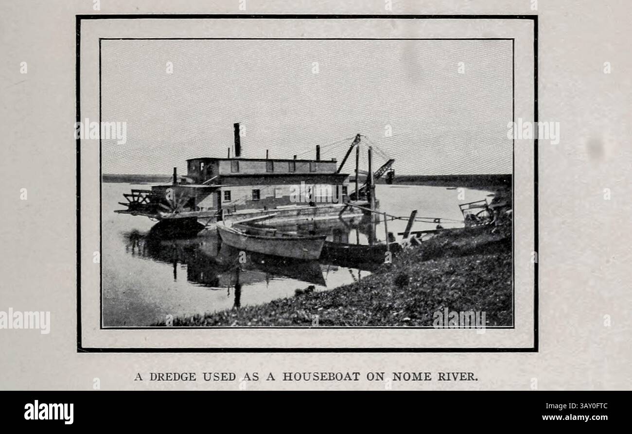 A DREDGE USED AS A HOUSEBOAT ON NOME RIVER. from the Article THE GOLD ...