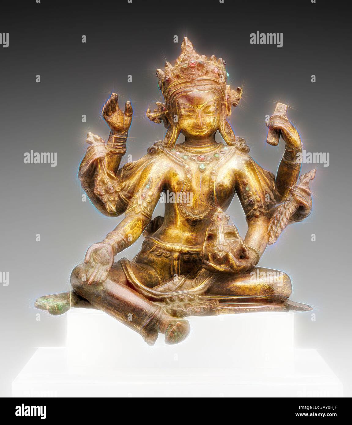Multi armed deity holds hi-res stock photography and images - Alamy