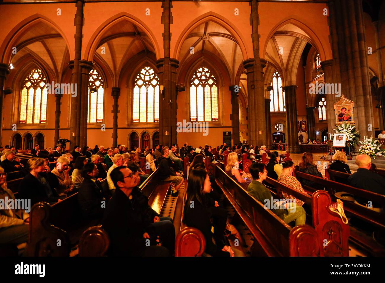 People gather in silence at St Patrick's Cathedral following news of ...