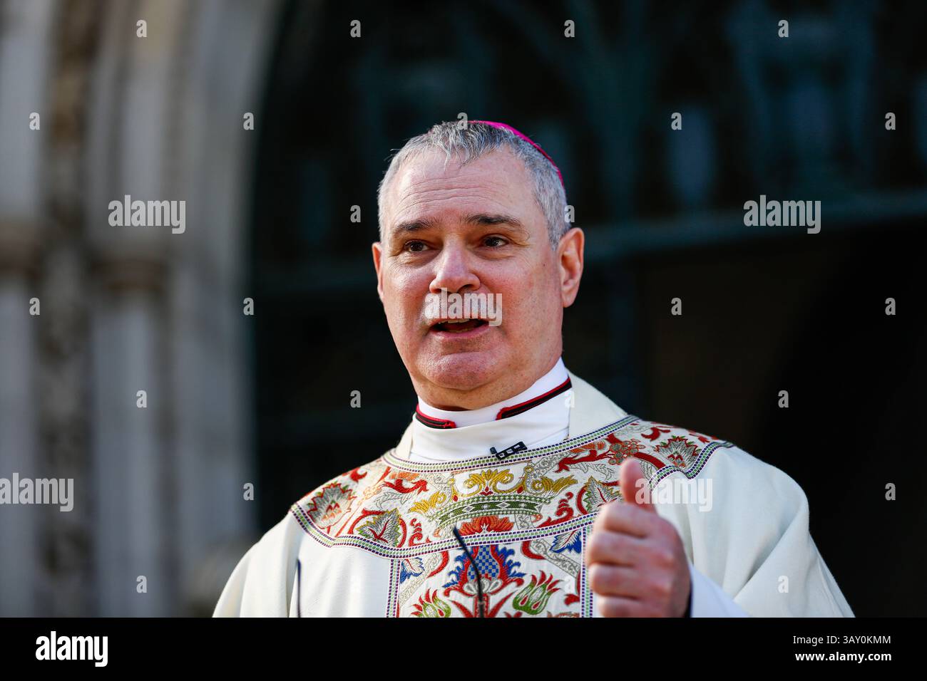 Archbishop Peter A. Comensoli speaks to the media outside St Patrickís ...