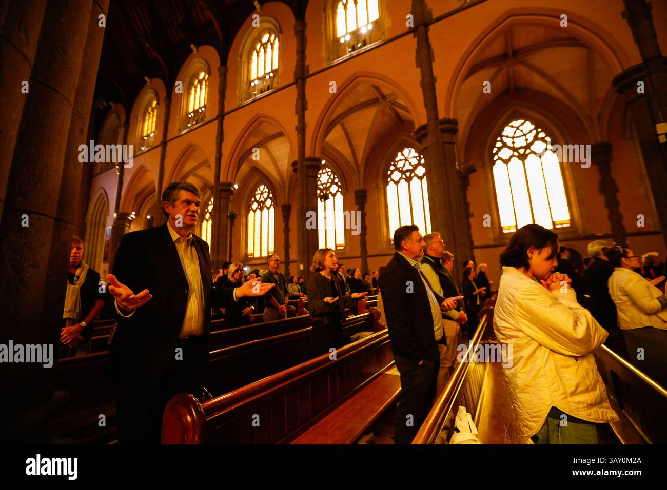 People gather in silence at St Patrick's Cathedral following news of ...