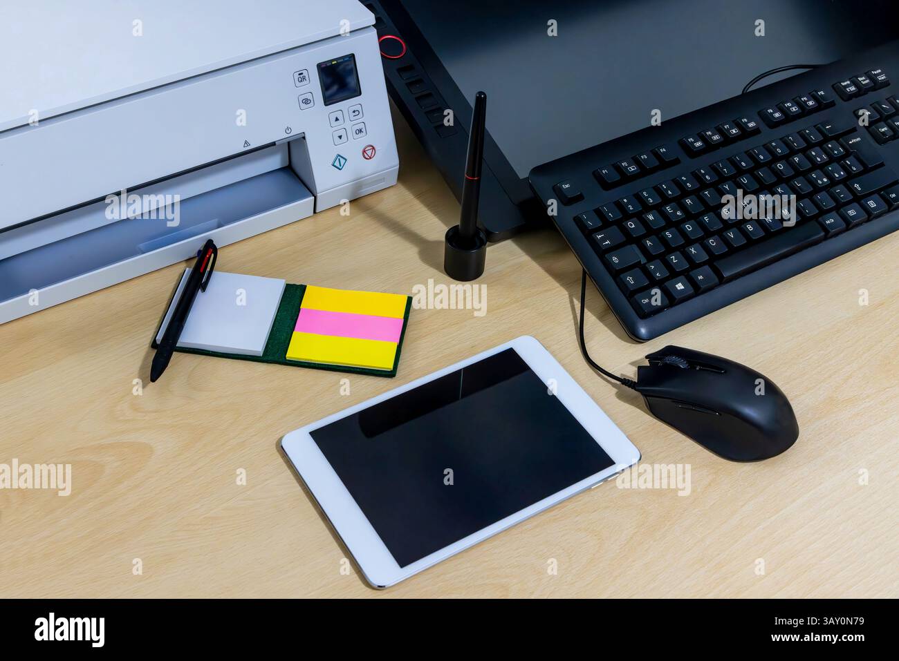 Desk with close-up of keyboard, tablet and printer Stock Photo - Alamy
