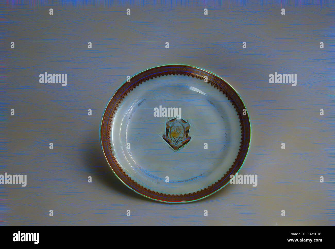 A decorative plate featuring an intricate design at the center ...