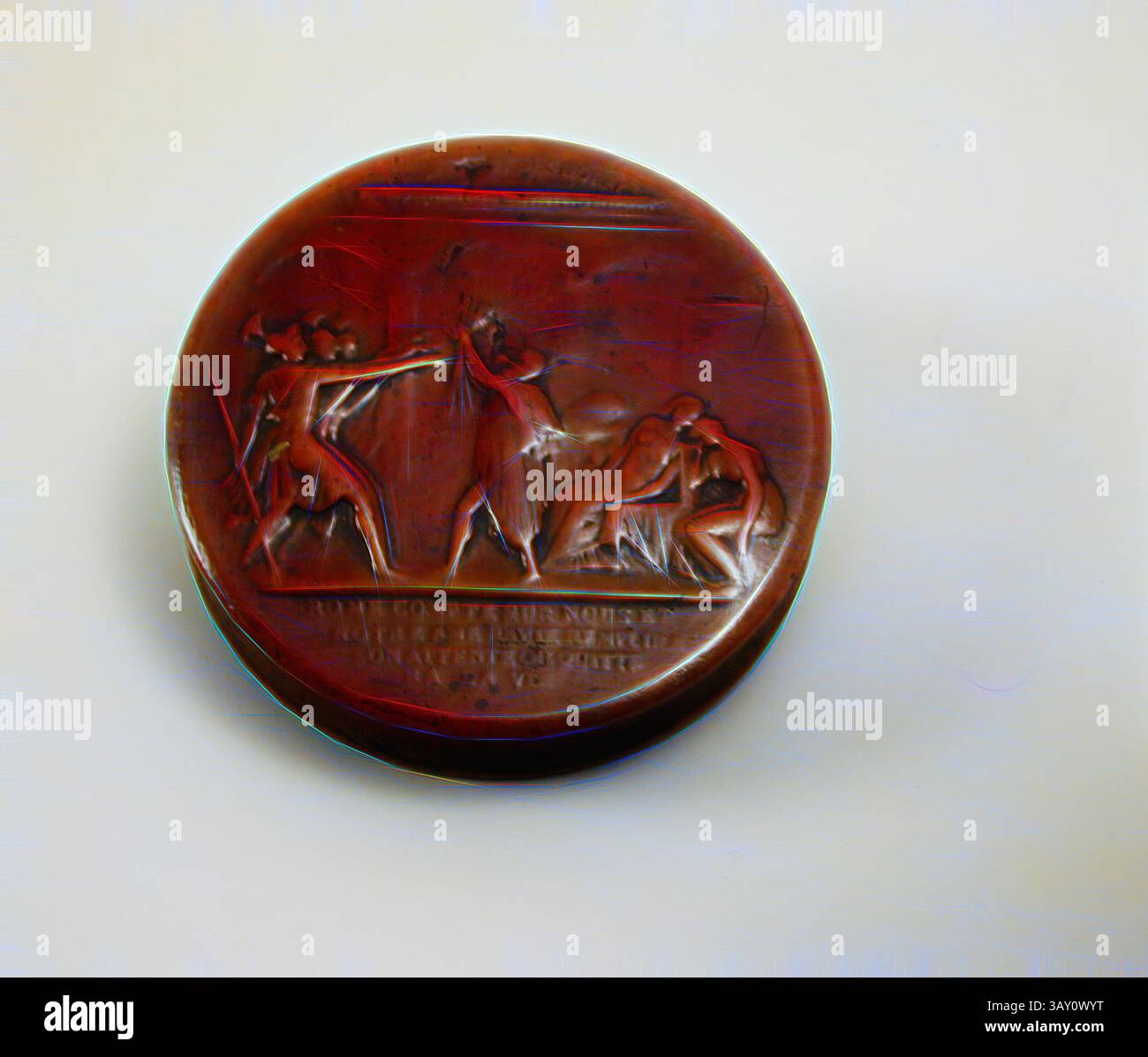 A circular medallion features intricate relief carvings depicting ...