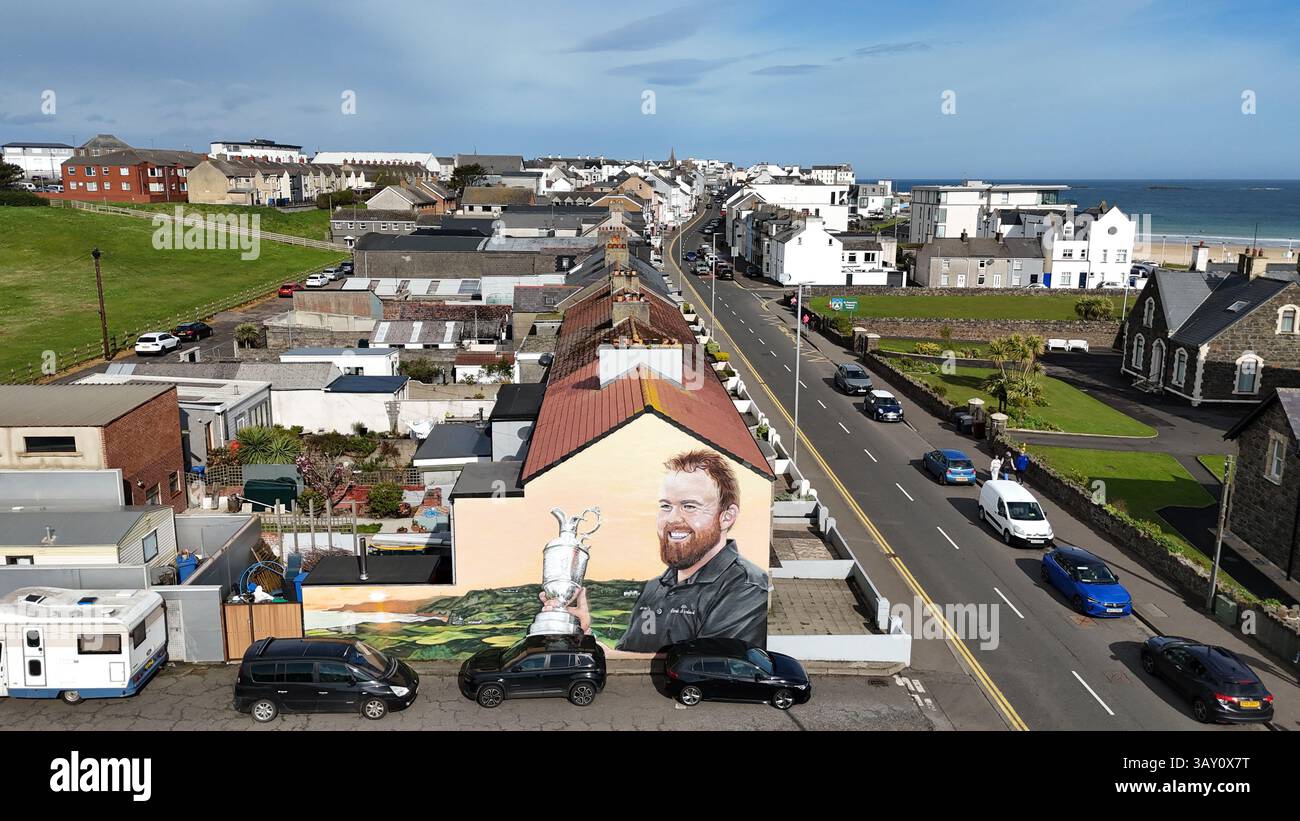 A mural of Shane Lowry with the Claret Jug painted on a house near the ...
