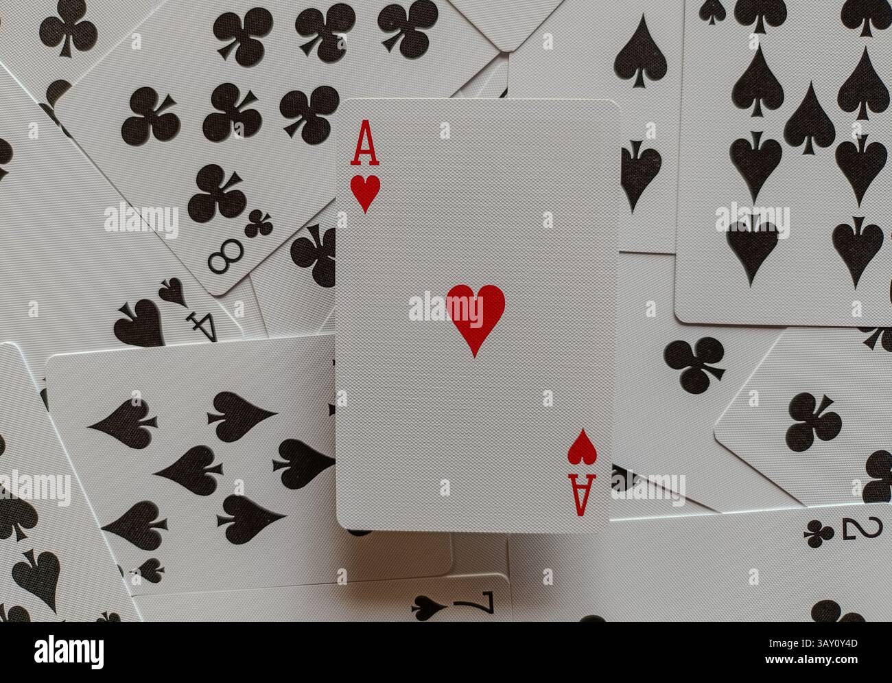 Ace of Hearts playing card, prominently displayed against a backdrop of ...