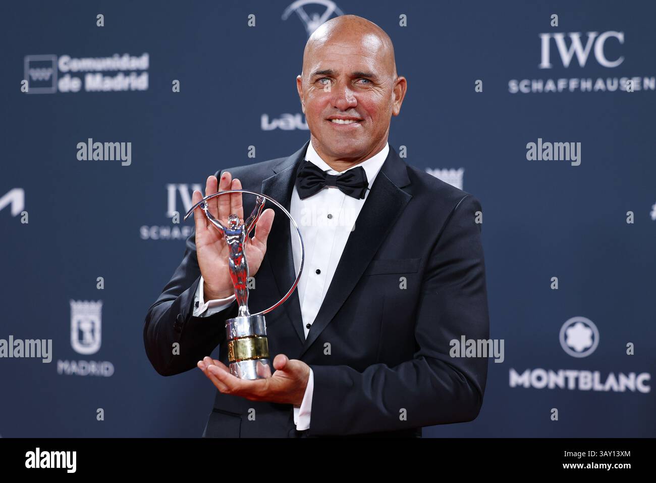 Kelly Slater poses with the award during the Laureus World Sports ...