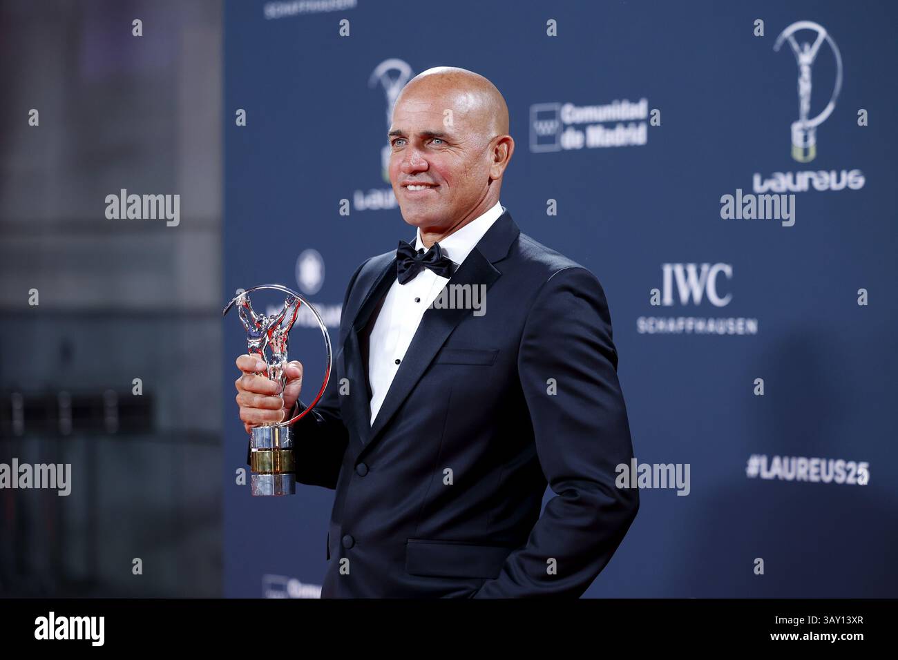 Kelly Slater poses with the award during the Laureus World Sports ...