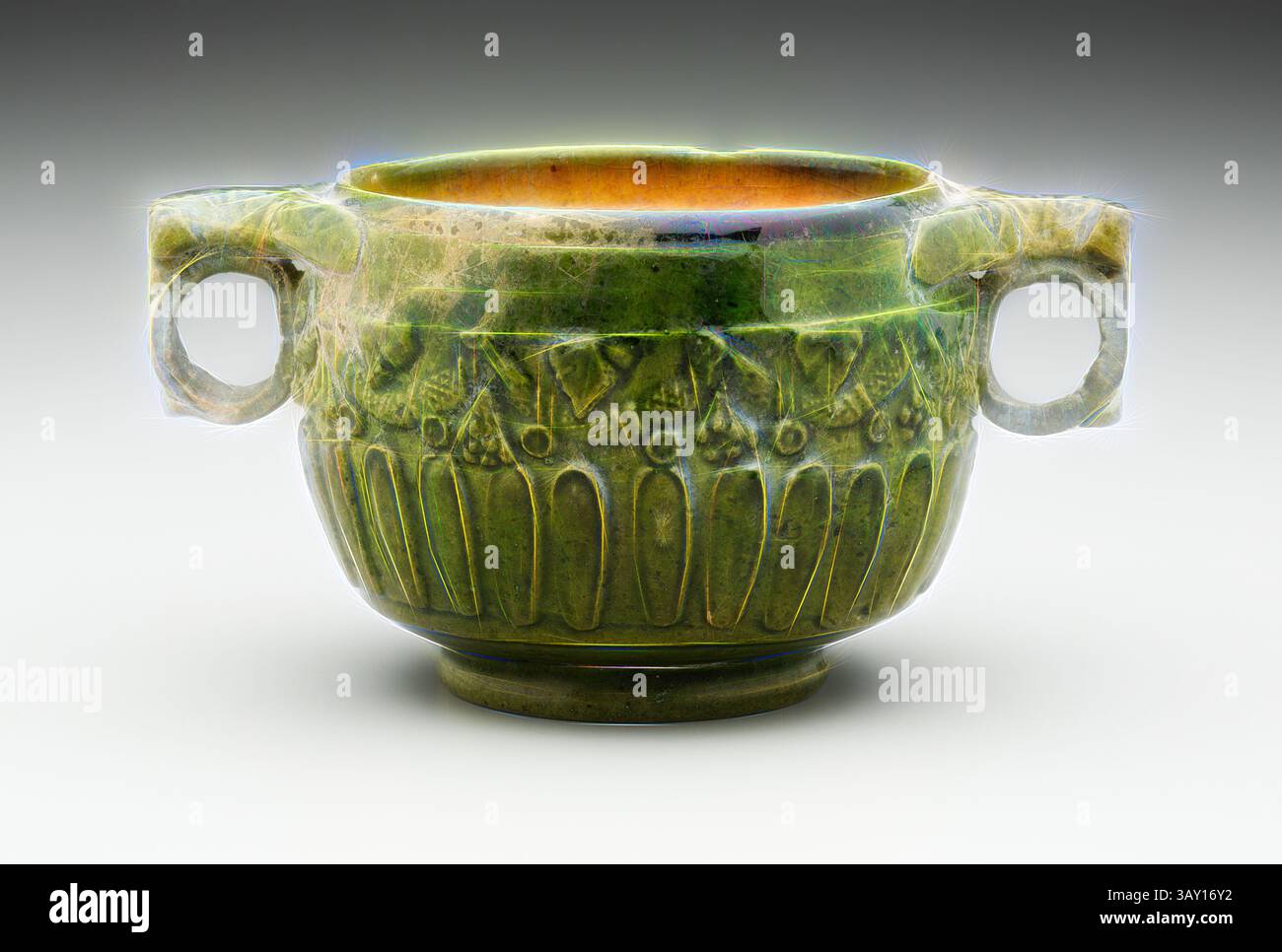 An intricately designed ancient vessel featuring ornate carvings and ...