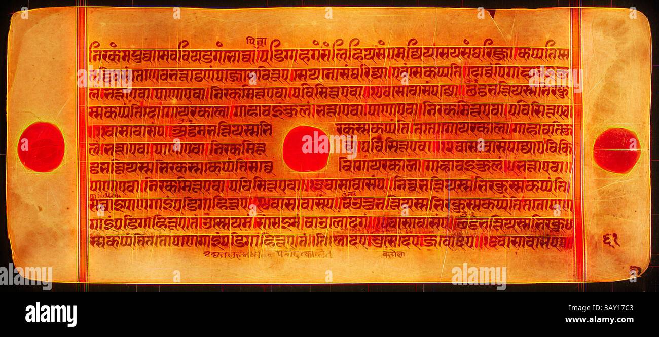 An ancient manuscript inscribed with intricate verses in a traditional ...