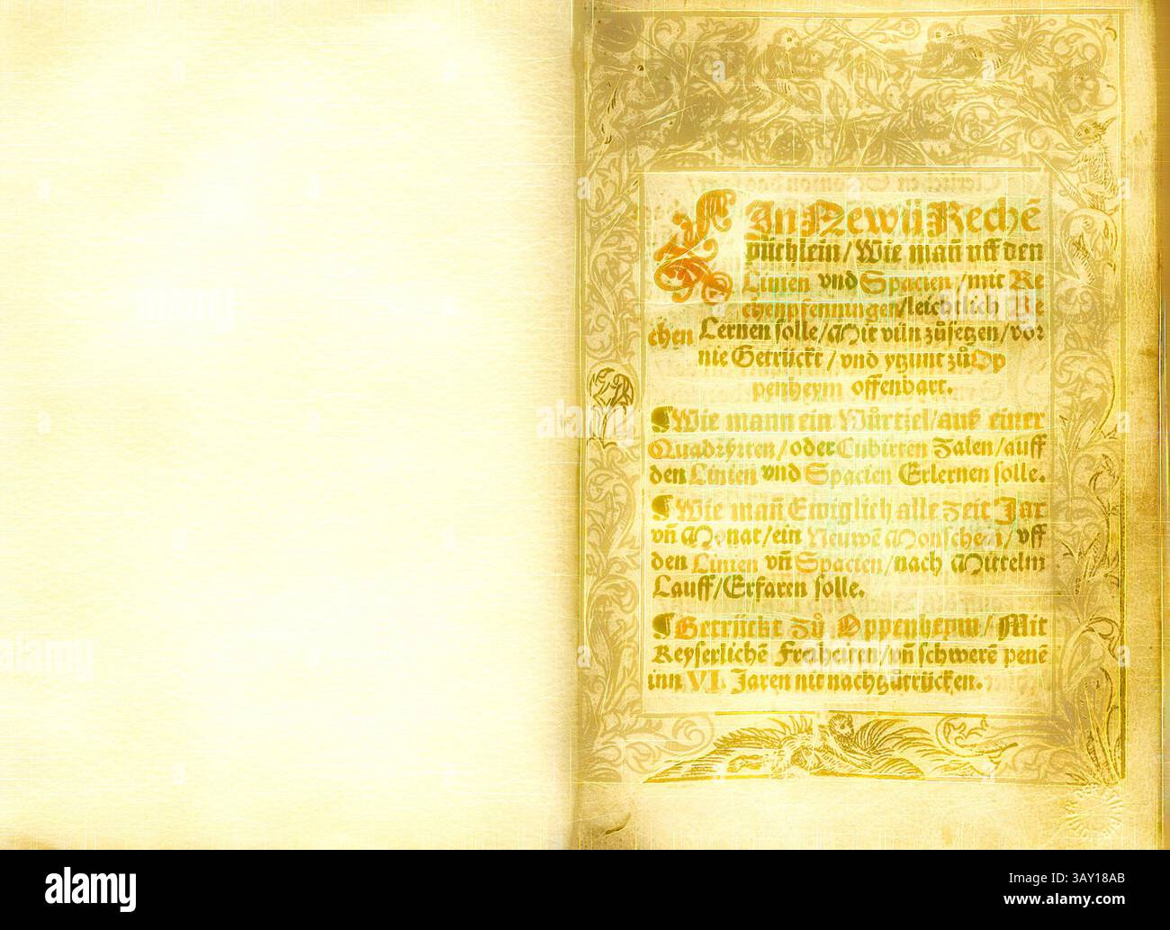 An ornate page featuring intricate calligraphy and decorative elements ...