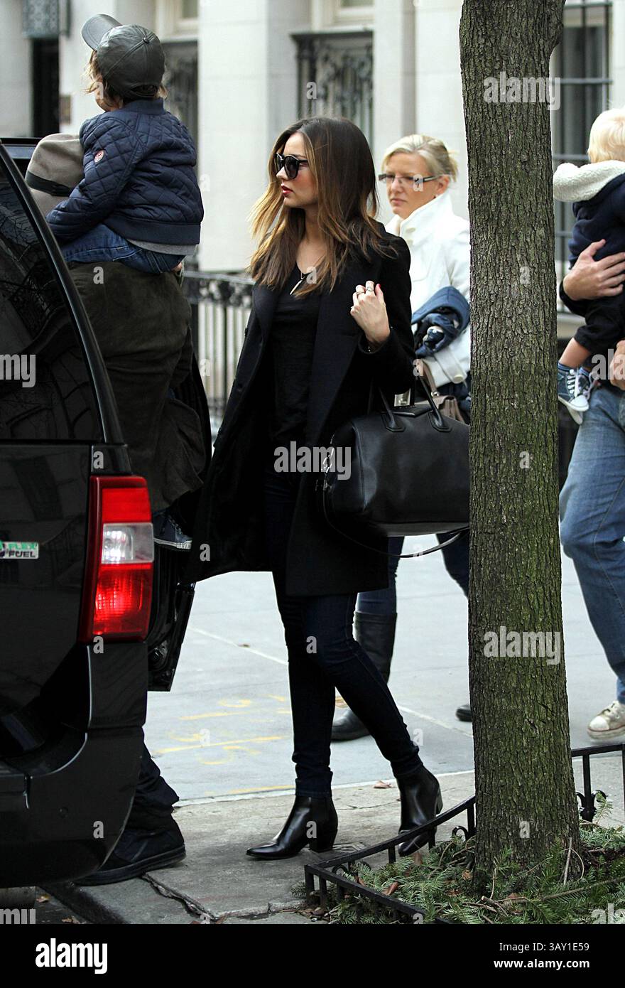 Miranda Kerr and Orlando Bloom with their son Flynn Bloom outside their ...