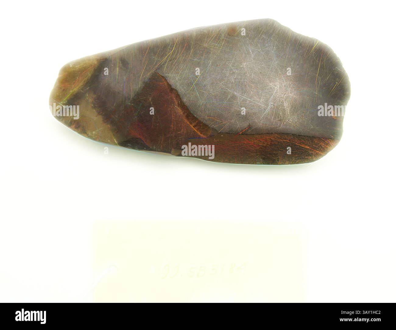 A smooth, flat stone with a polished surface showcases a blend of ...