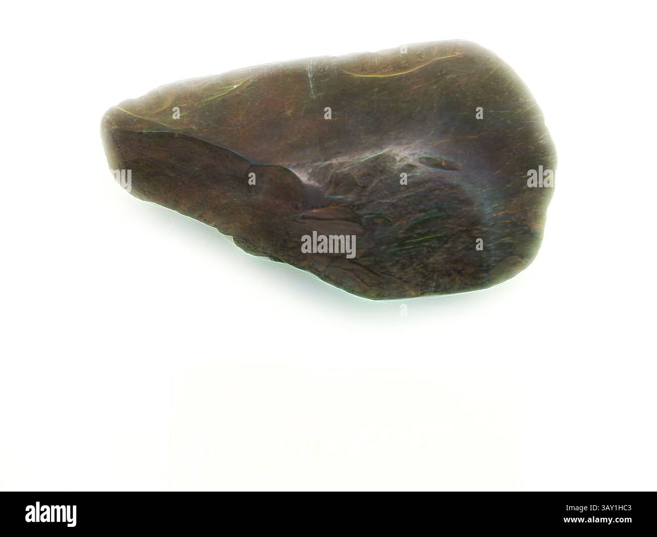 A smooth, irregularly shaped stone with a glossy surface, showcasing ...