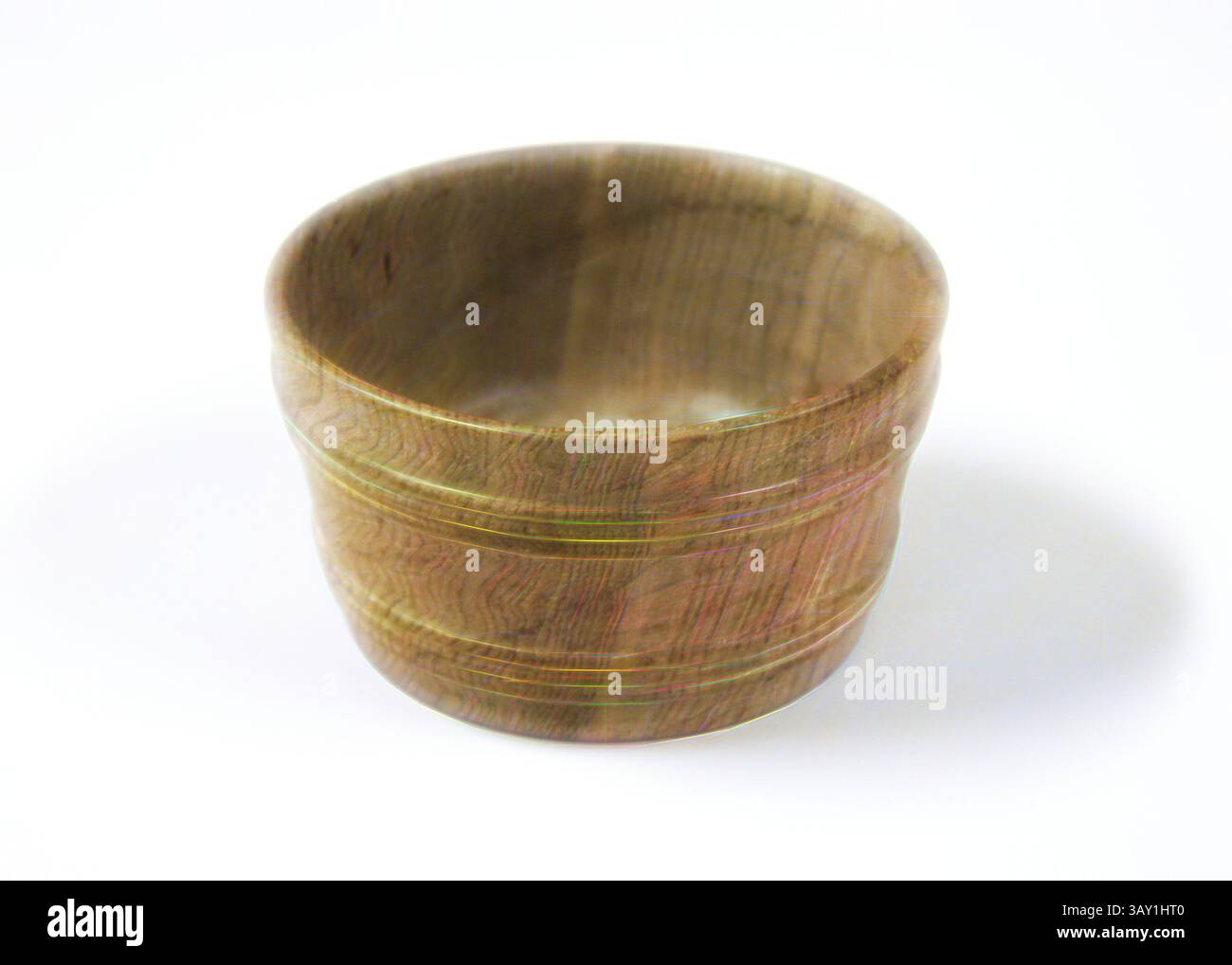 A beautifully crafted wooden bowl featuring a smooth, rounded design ...
